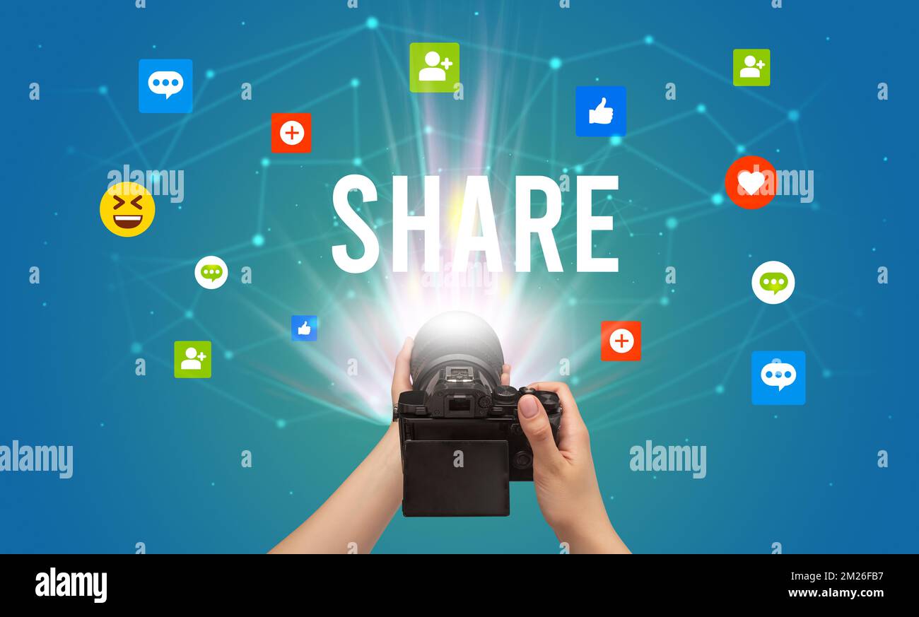 Using camera to capture social media content Stock Photo - Alamy