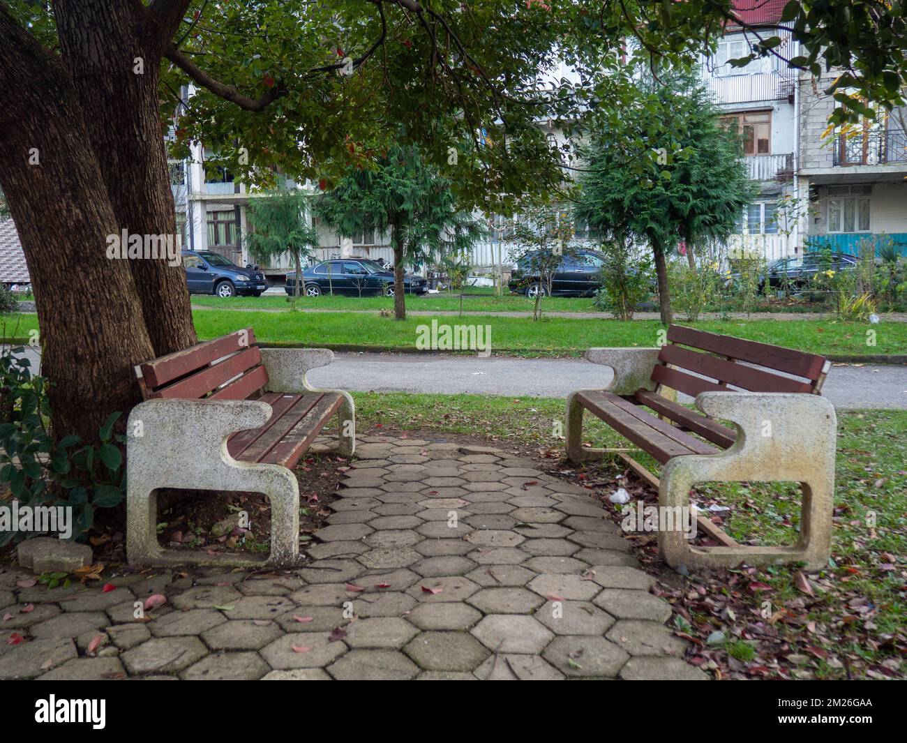 Benches on the street. Urban environment. Old benches made of wood and ...