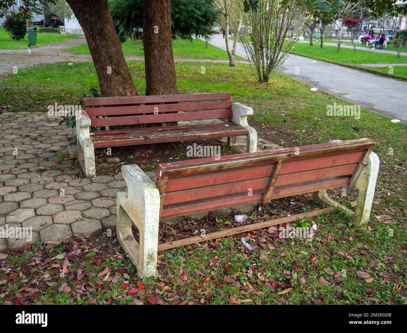 Benches on the street. Urban environment. Old benches made of wood and ...
