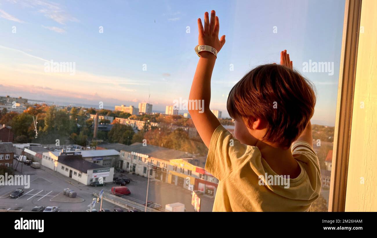 Kid looking window school hi-res stock photography and images - Alamy