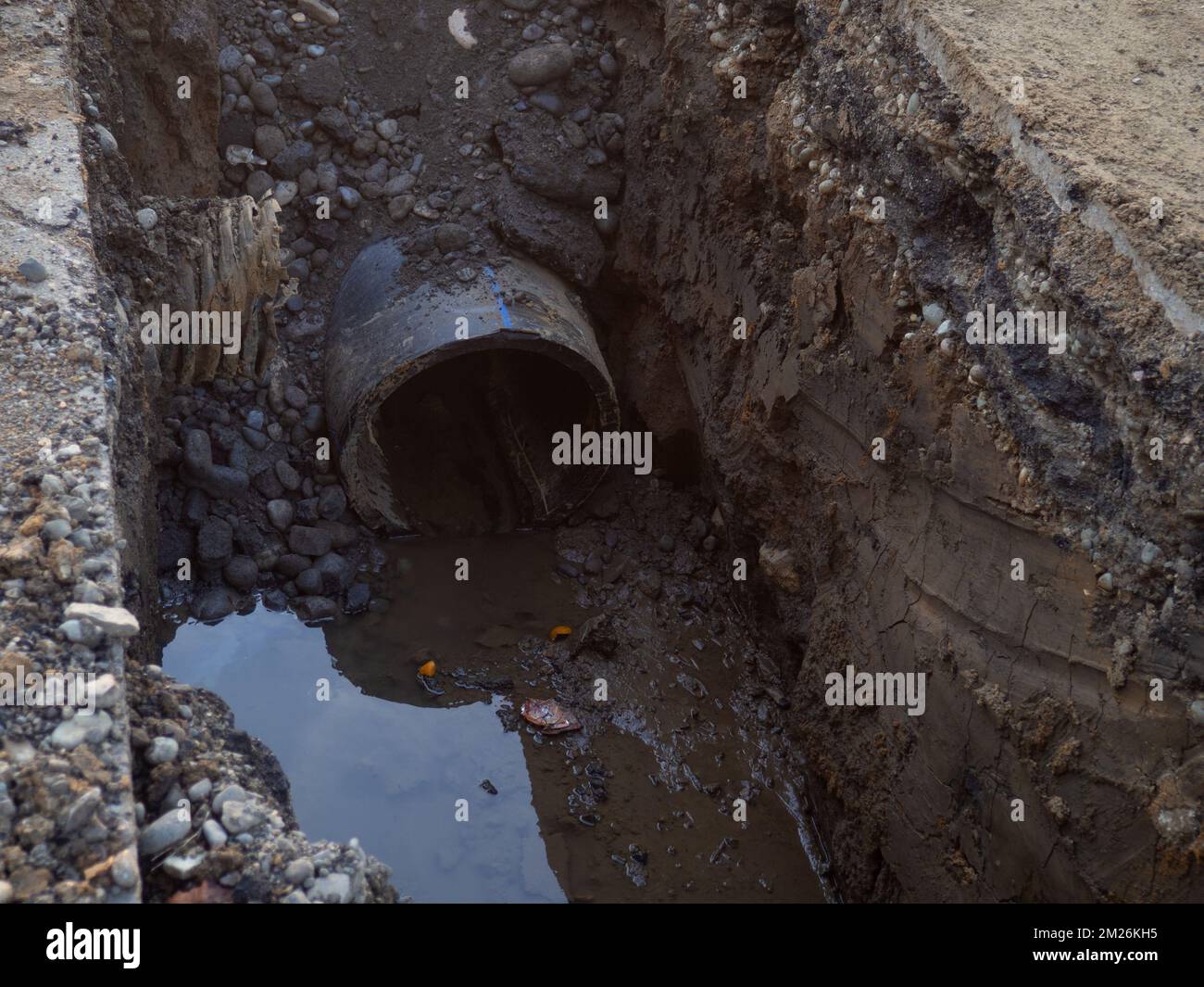 Works on the replacement of sewer pipes. Thick pipes underground ...