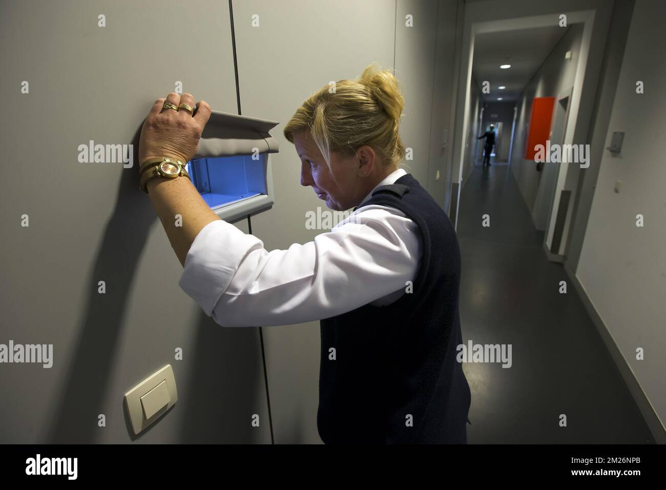 Illustration picture shows a female prison guard checking inside a cel ...