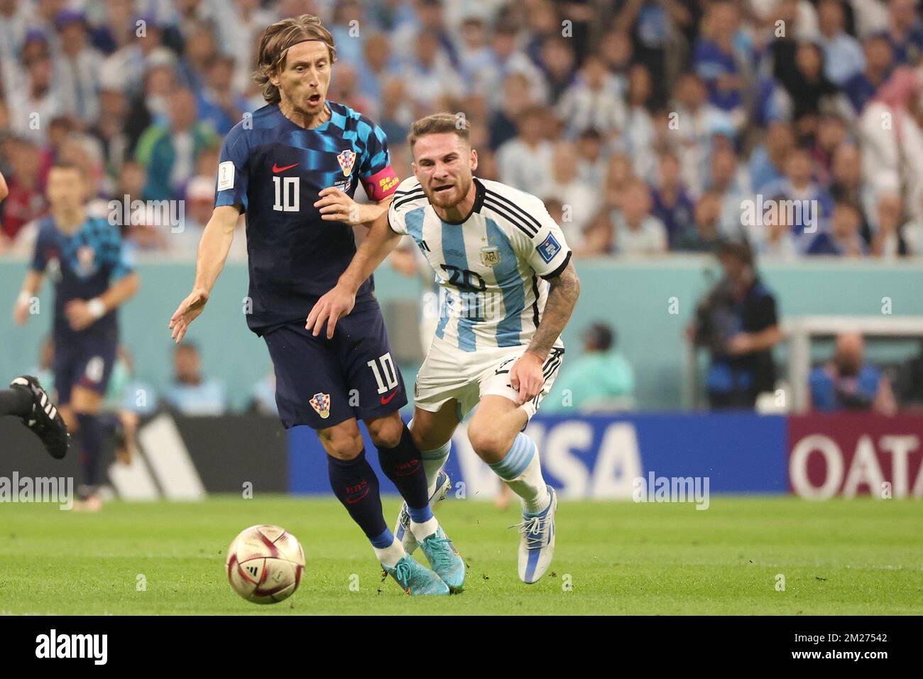Luka Modric of Croatia, Alexis Mac Allister of Argentina during the ...