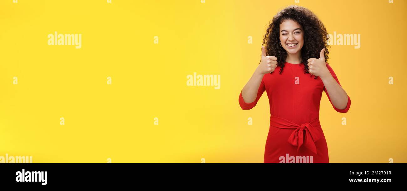 Creative and charismatic happy upbeat woman 25s with curly hair in red ...