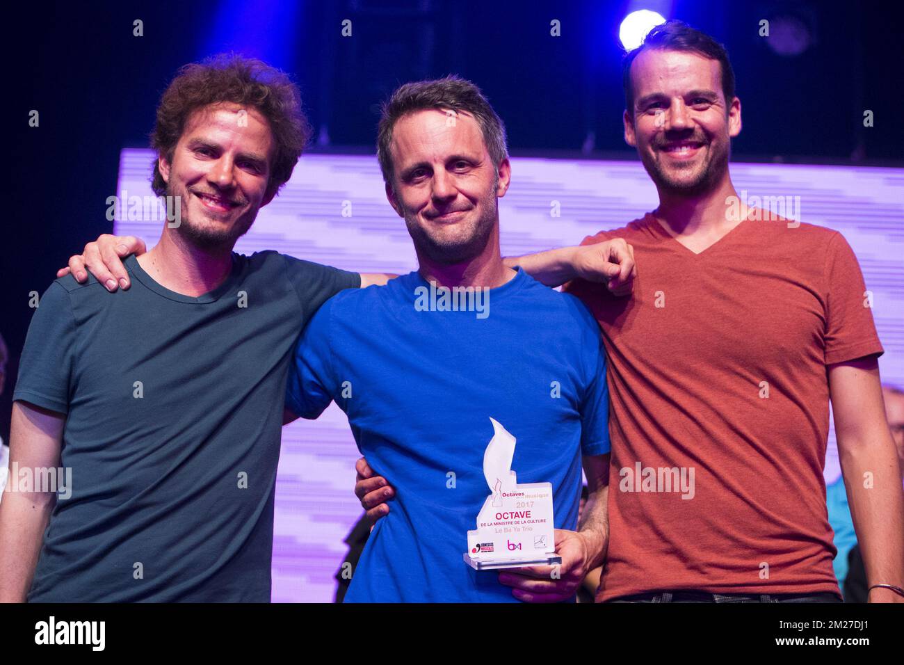 Le Baya Trio poses with his honnor 'Minister of Culture' prize at the ...