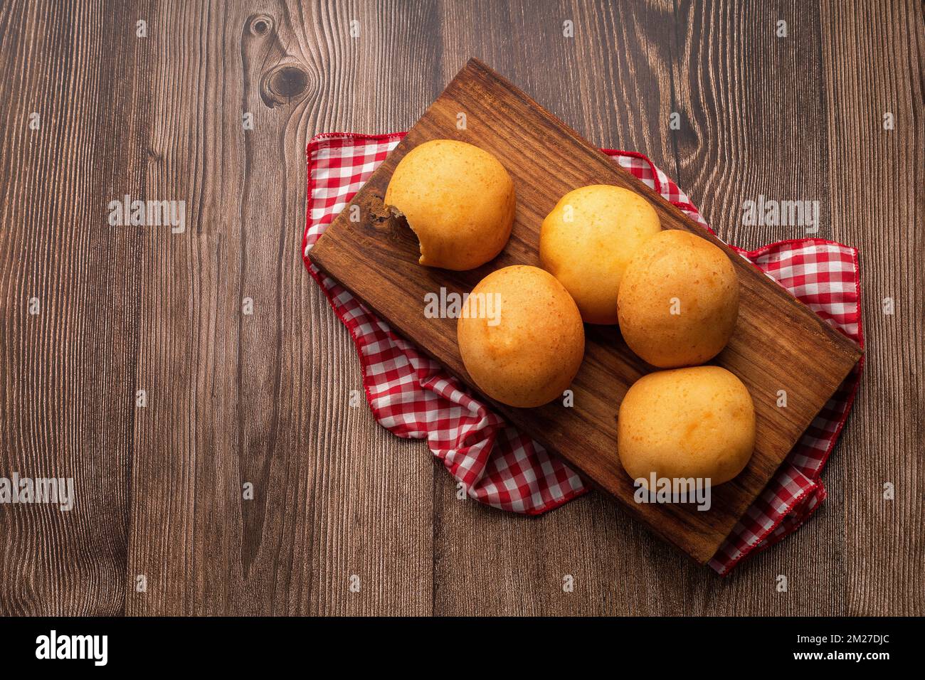Baked almojabanas for breakfast - Typical Colombian food Stock Photo ...