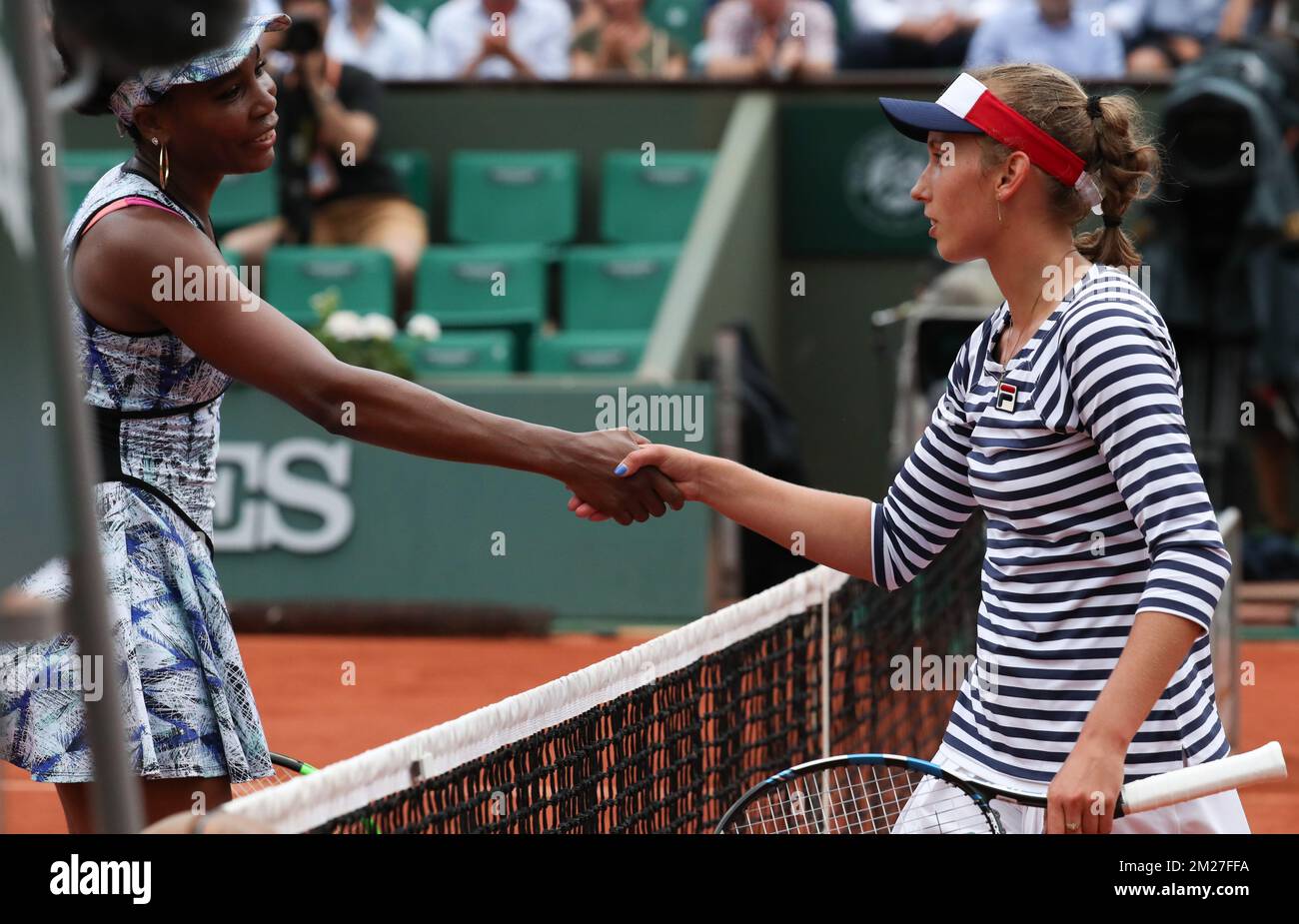 American Venus Williams and Belgian Elise Mertens shake hands at the ...