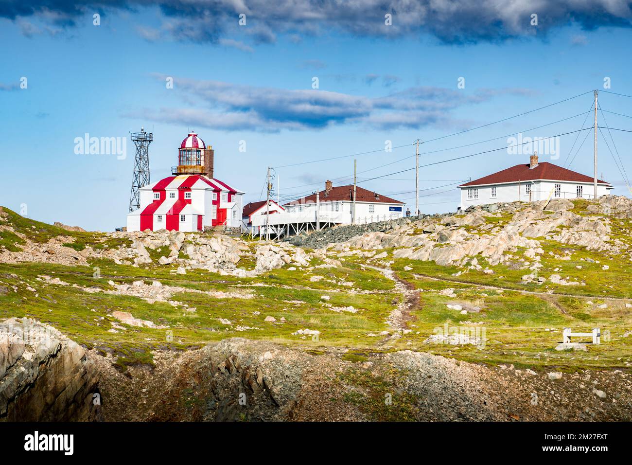 Red and white striped lighthouse popular landmark and historic building ...