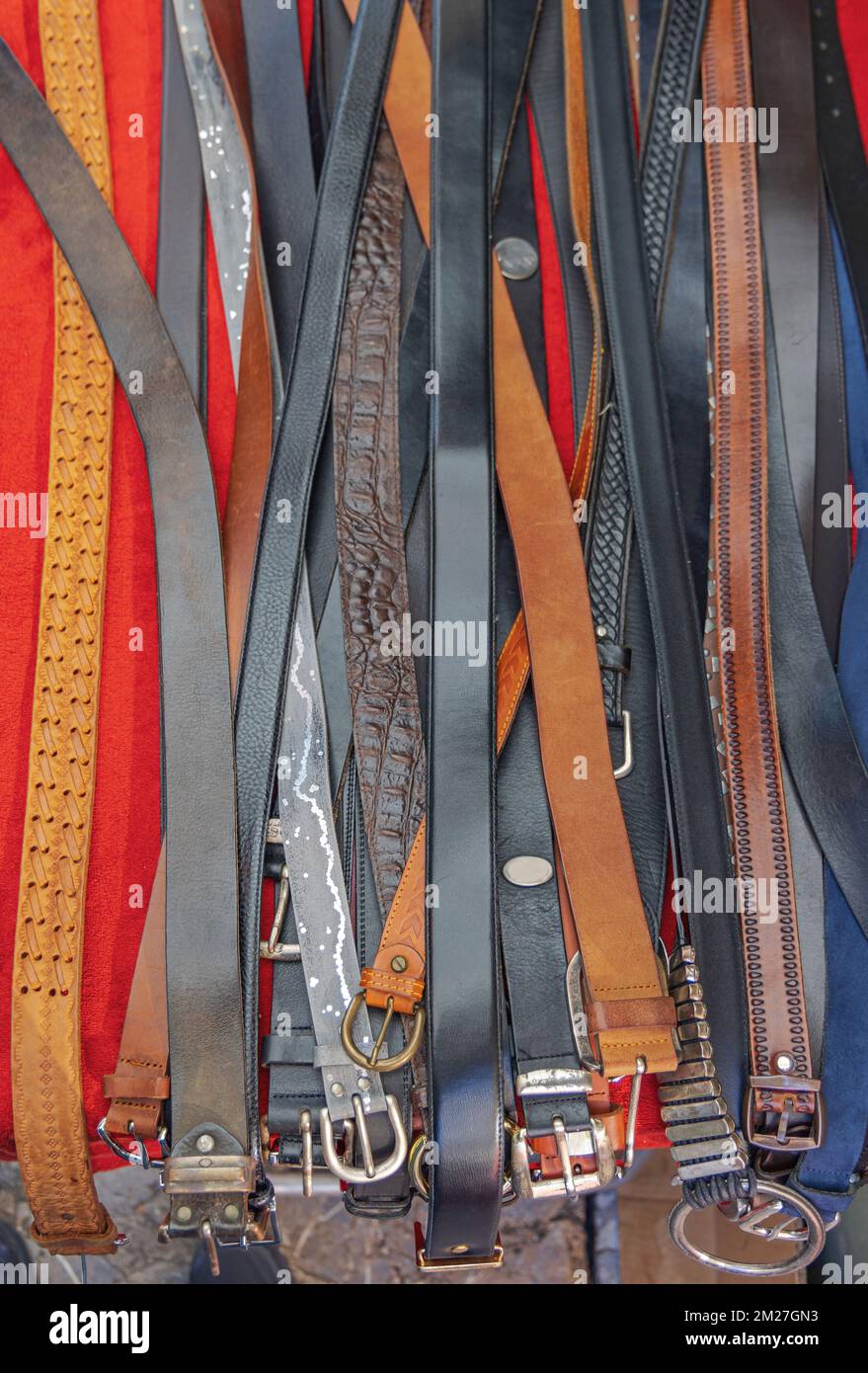 Large Collection of Classic Leather Belts With Metal Buckles Stock ...