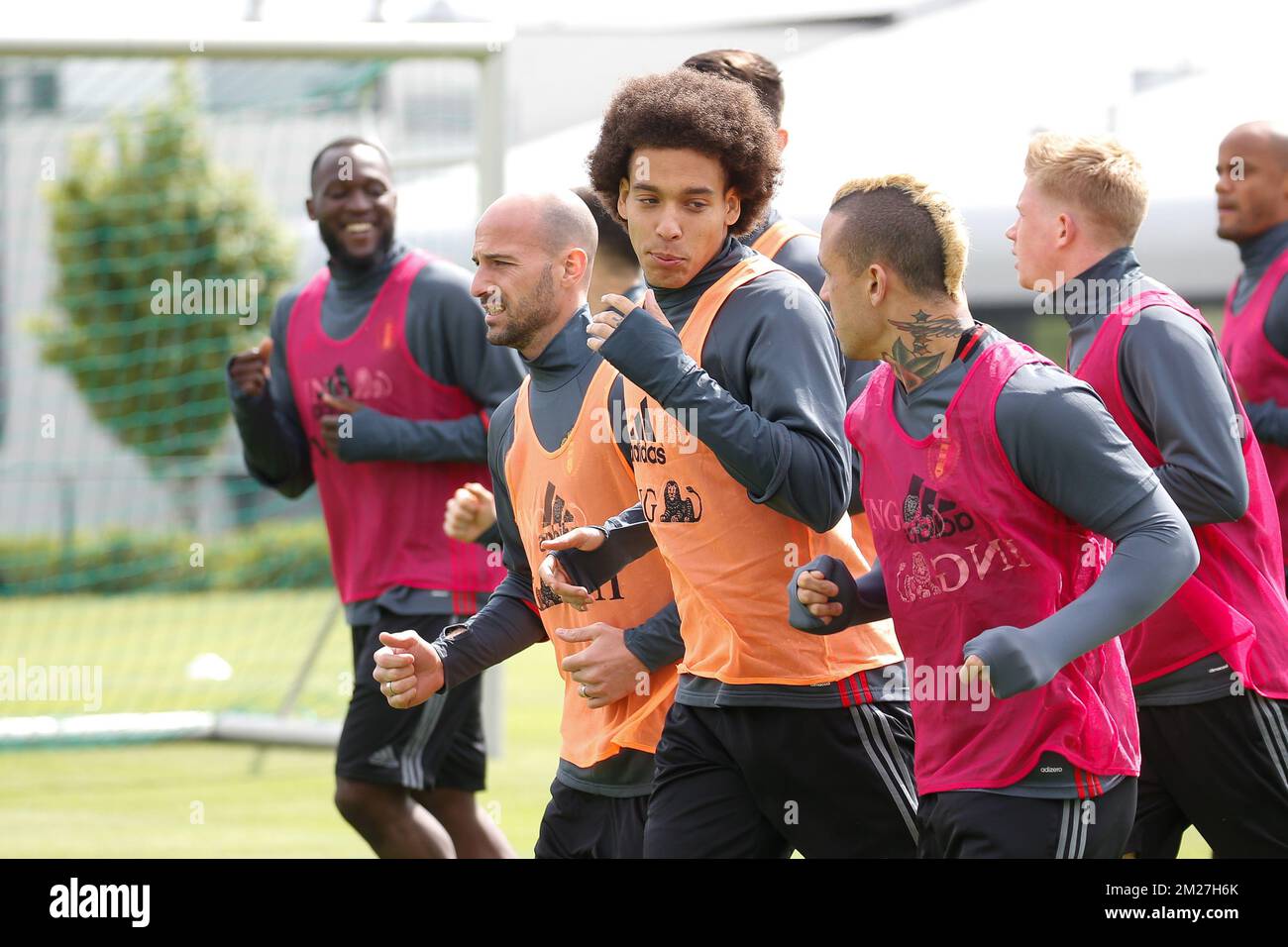 Belgium's Laurent Ciman, Belgium's Axel Witsel and Belgium's Radja ...