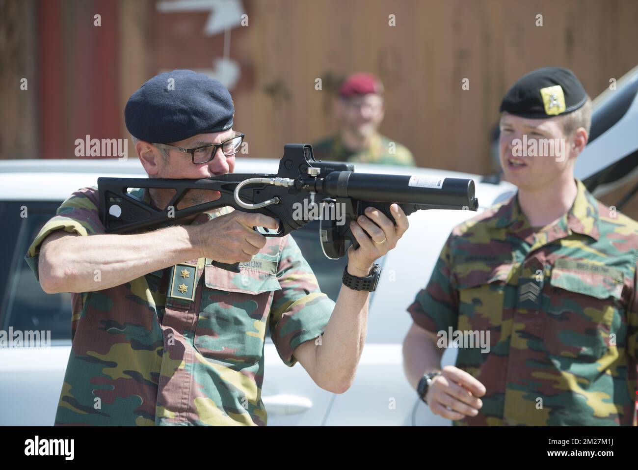 Illustration picture shows an officer holding an FN 303 semi-automatic ...