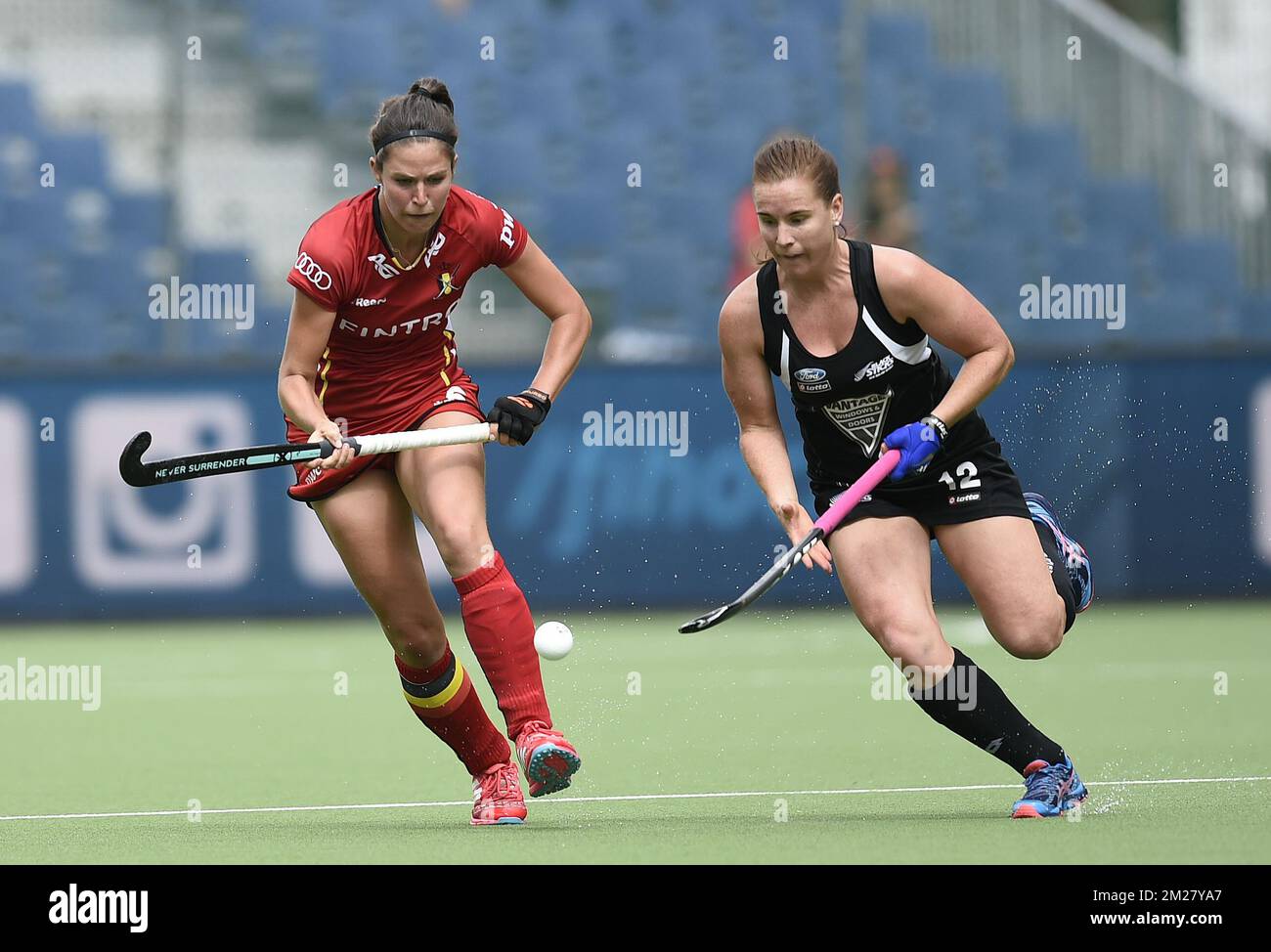 Belgium's Anouk Raes and New-Zealand's Ella Gunson fight for the ball ...