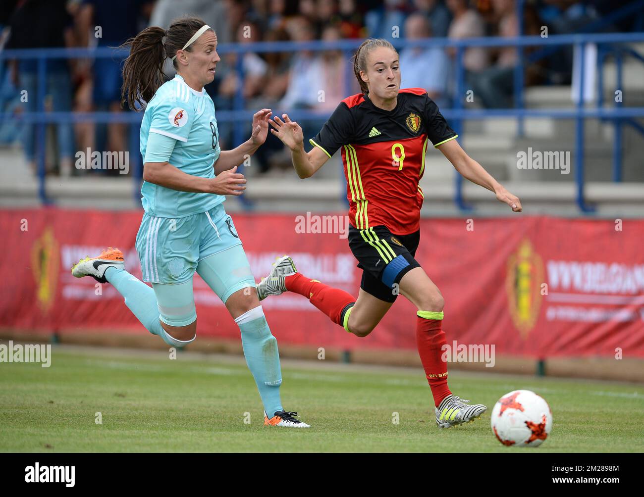 Russian Daria Makarenko and Belgium's Tessa Wullaert fight for the ball ...