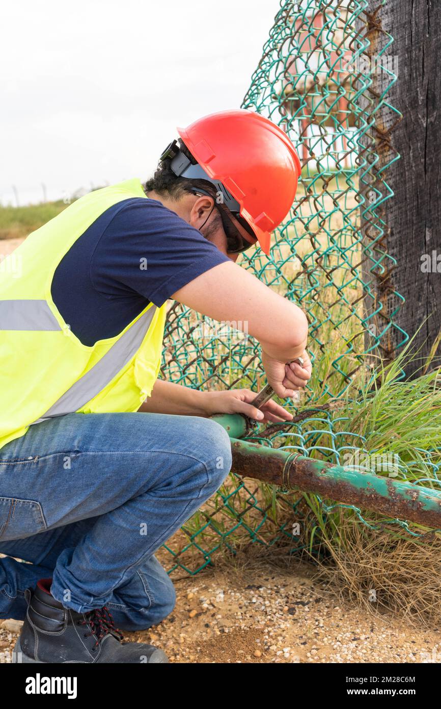 Industrial engineer working in an industrial park Stock Photo - Alamy