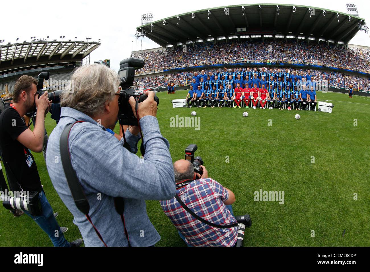 Club's players pose for the photographers for a team picture at the fan ...