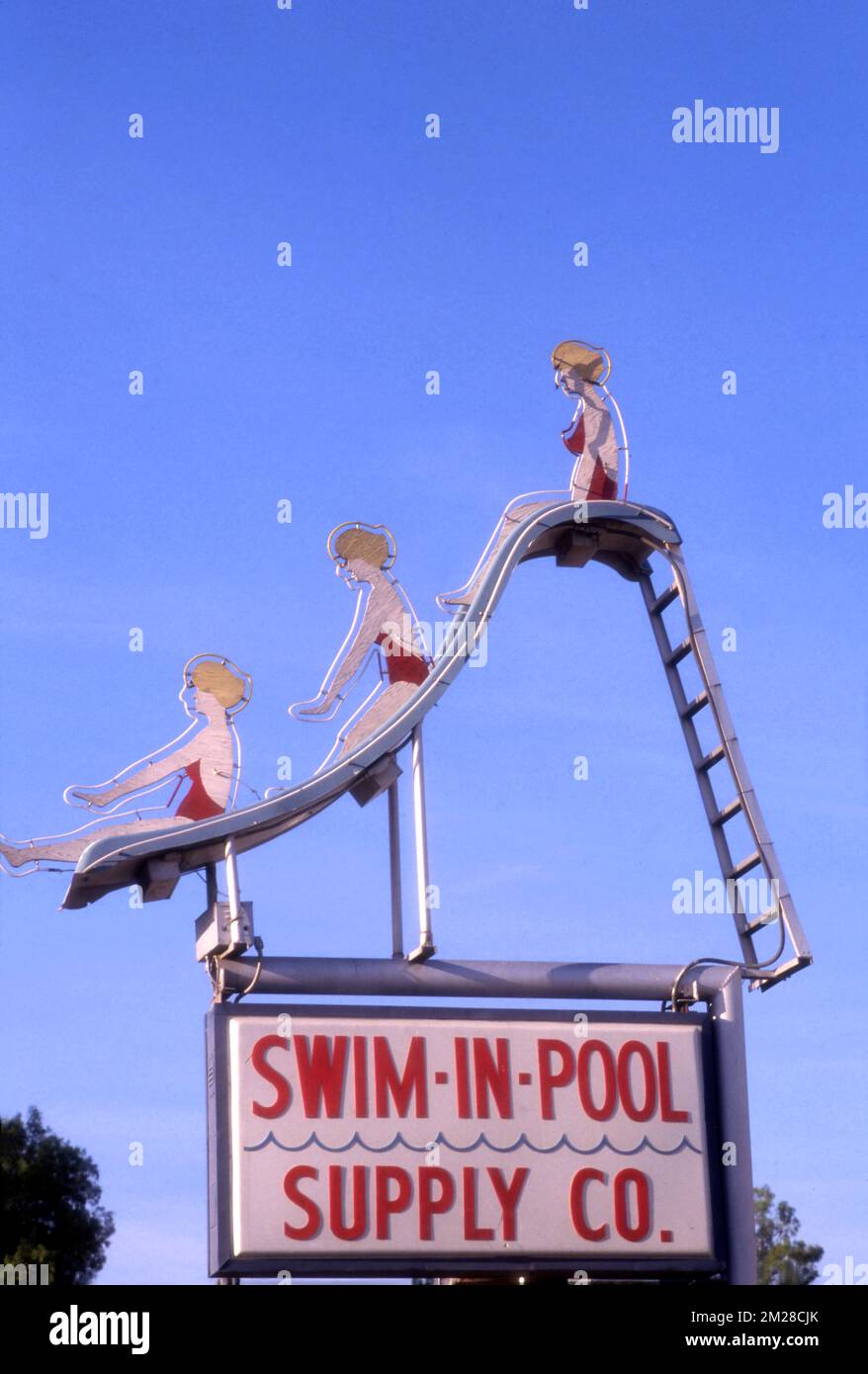 Swim in Pool Supply sign depicting a woman on a pool slide, Inglewood ...