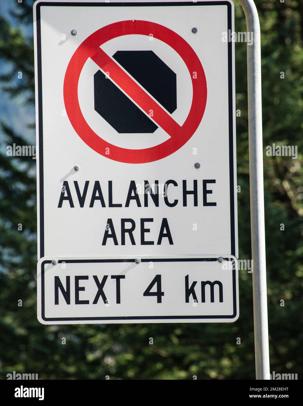 Avalanche area sign at the highway junction in Hope, British Columbia ...