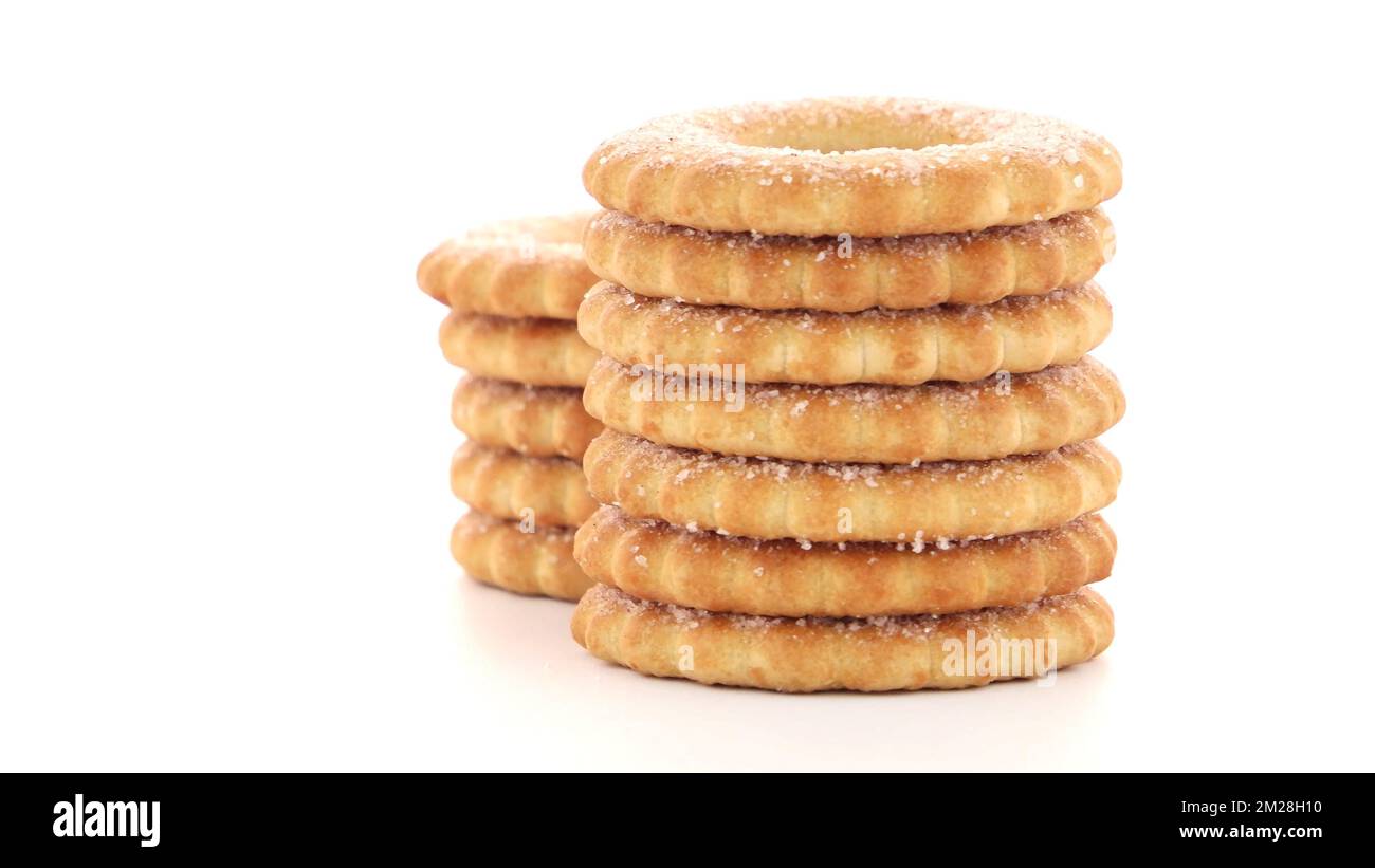 Rings biscuits pile isolated on a white background Stock Photo - Alamy