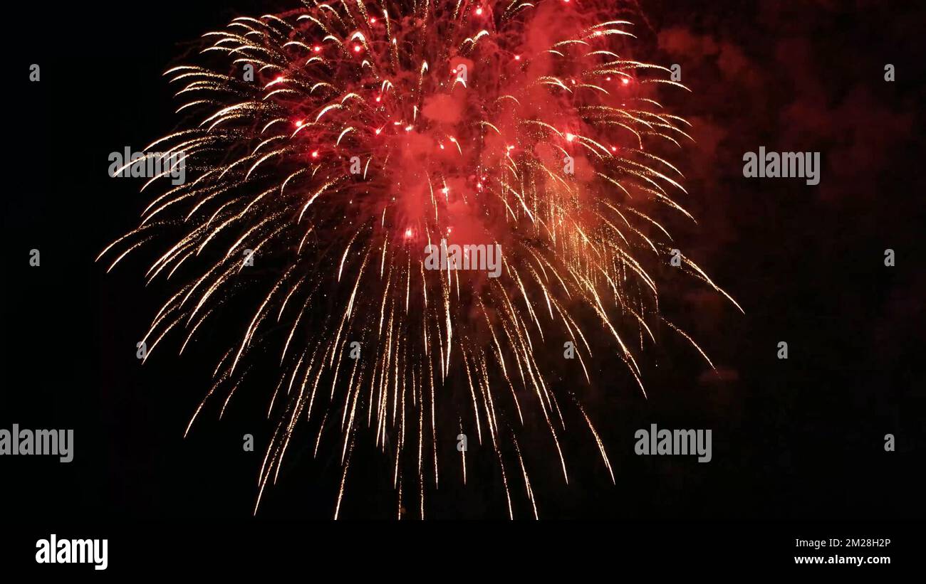 Beautiful fireworks show on a dark night sky Stock Photo - Alamy