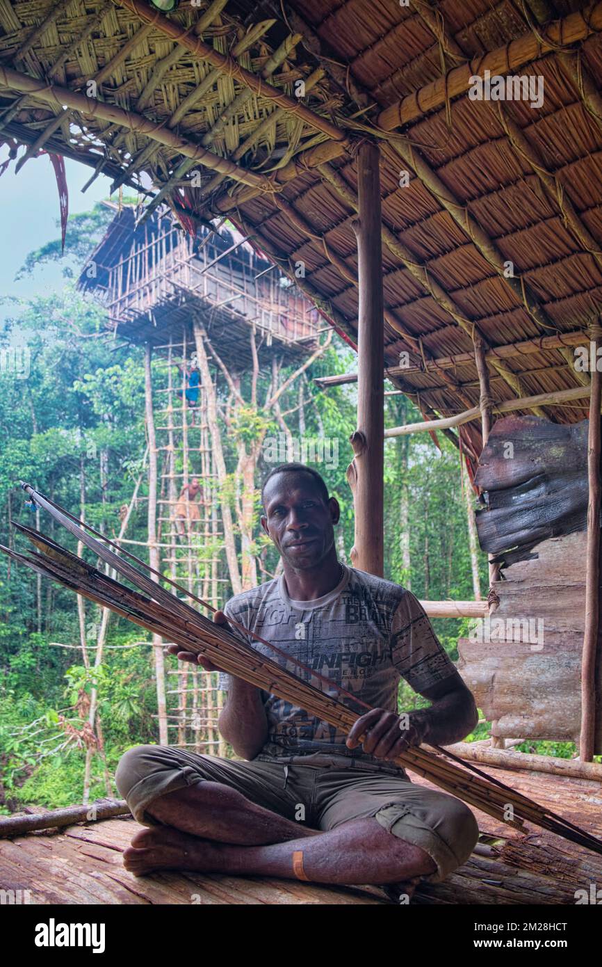 The Korowai tribe, often referred to as the Tree Asmat Tribe because ...