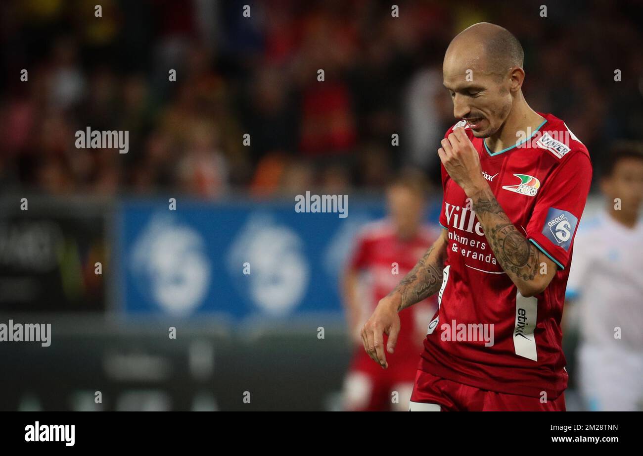 Oostende's Franck Berrier looks dejected during a soccer game between ...