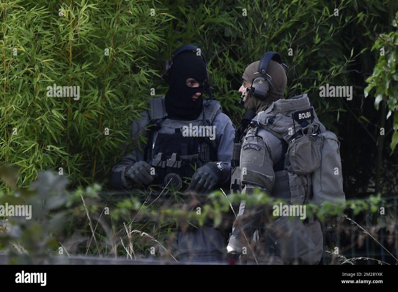 Police pictured on the scene of a hostage situation in Wanze, Wednesday ...