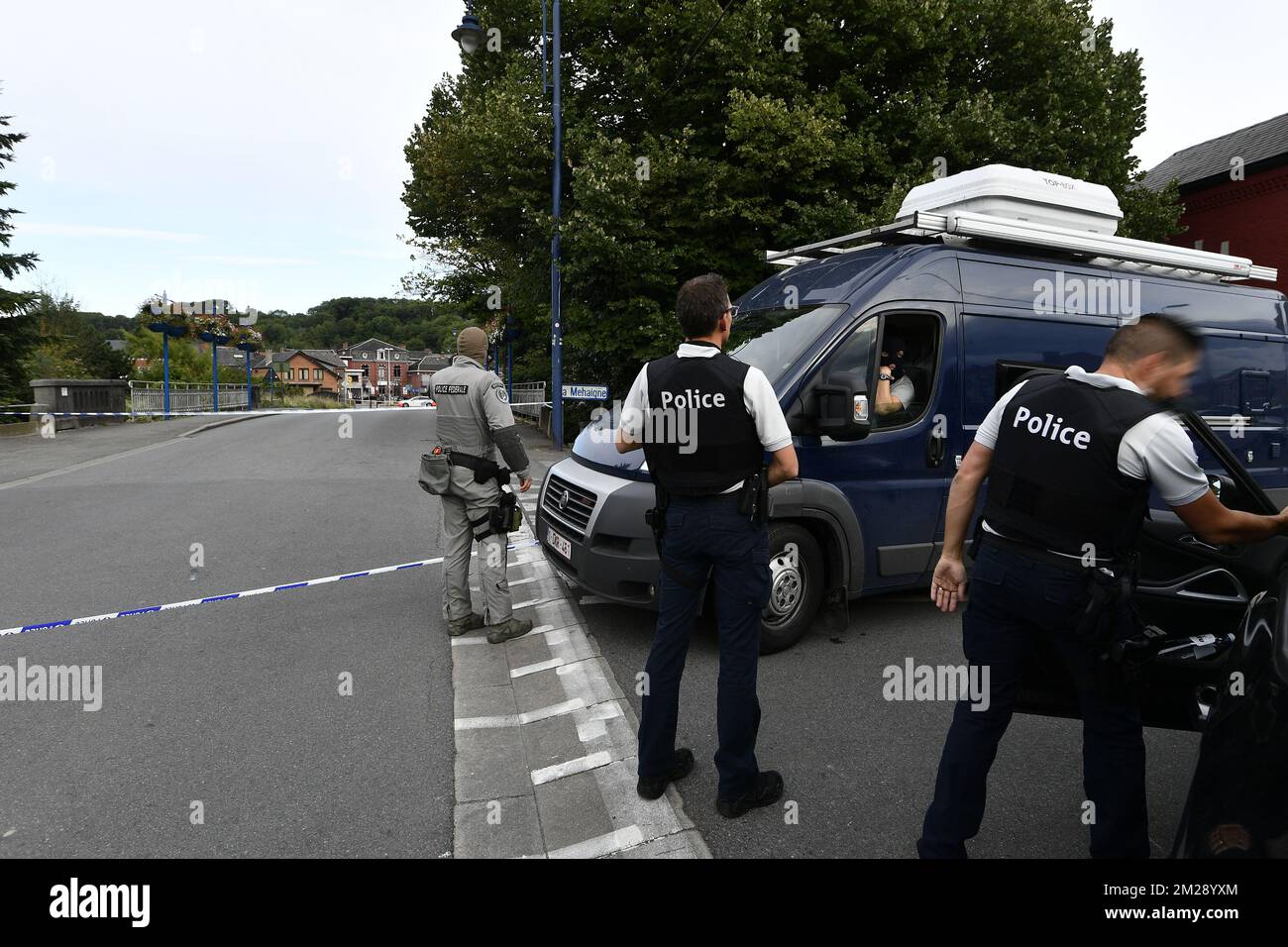 Police pictured on the scene of a hostage situation in Wanze, Wednesday ...