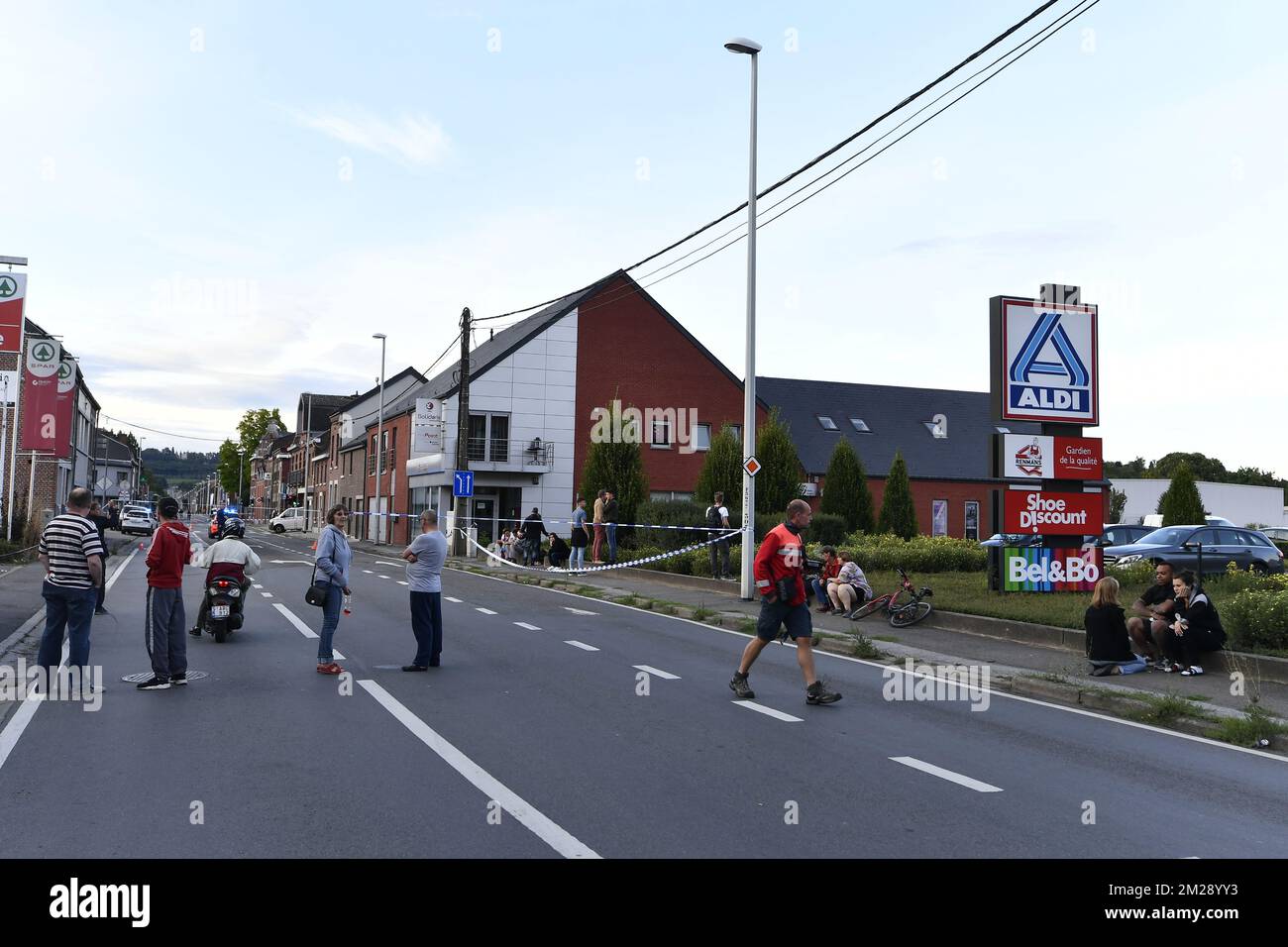 People pictured on the scene of a hostage situation in Wanze, Wednesday ...