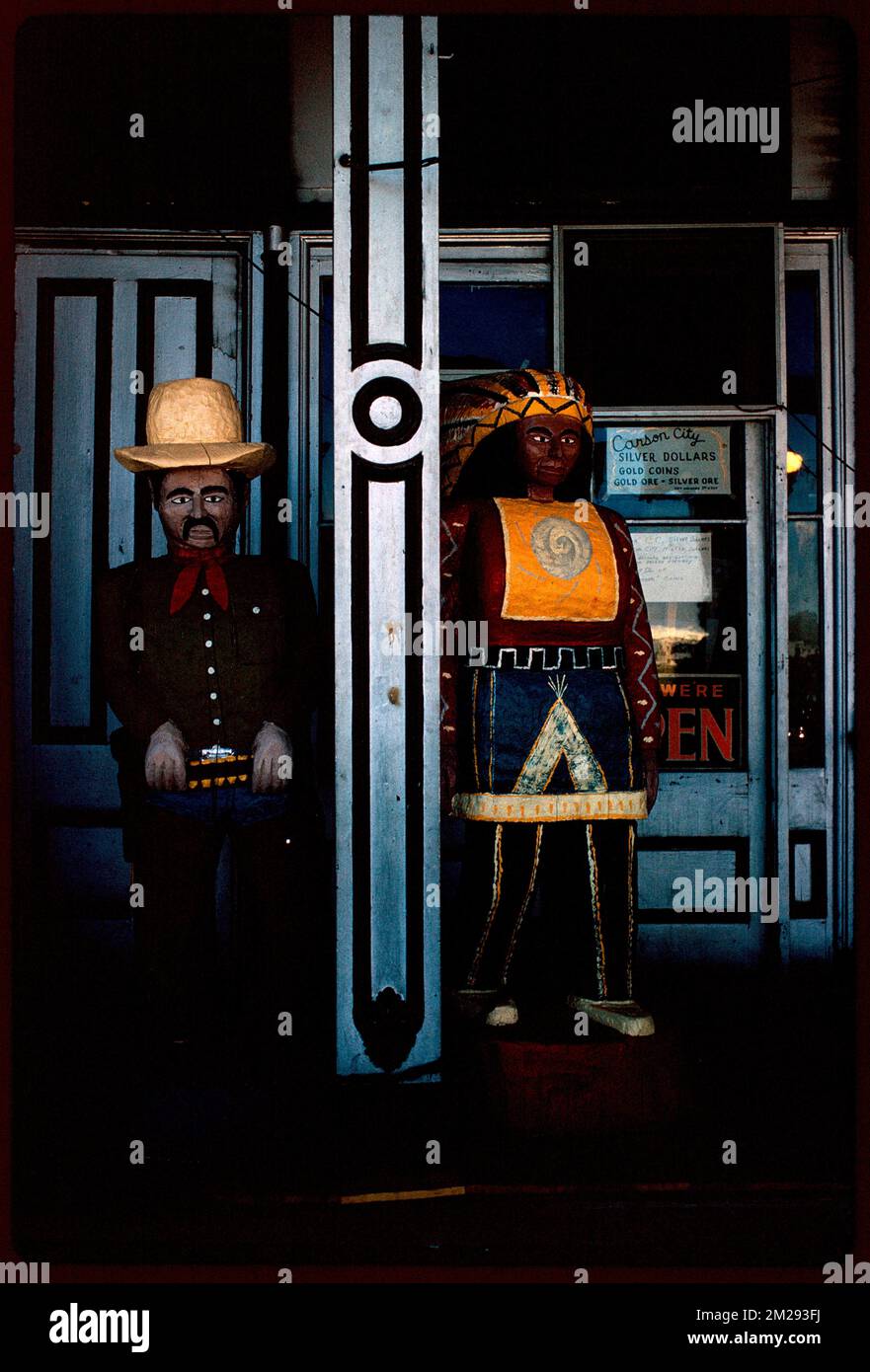 Cigar store figures outside storefront, likely Virginia City, Nevada ...