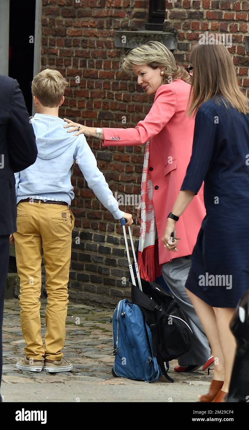 Prince Emmanuel pictured at the entrance of his school, with his mother ...