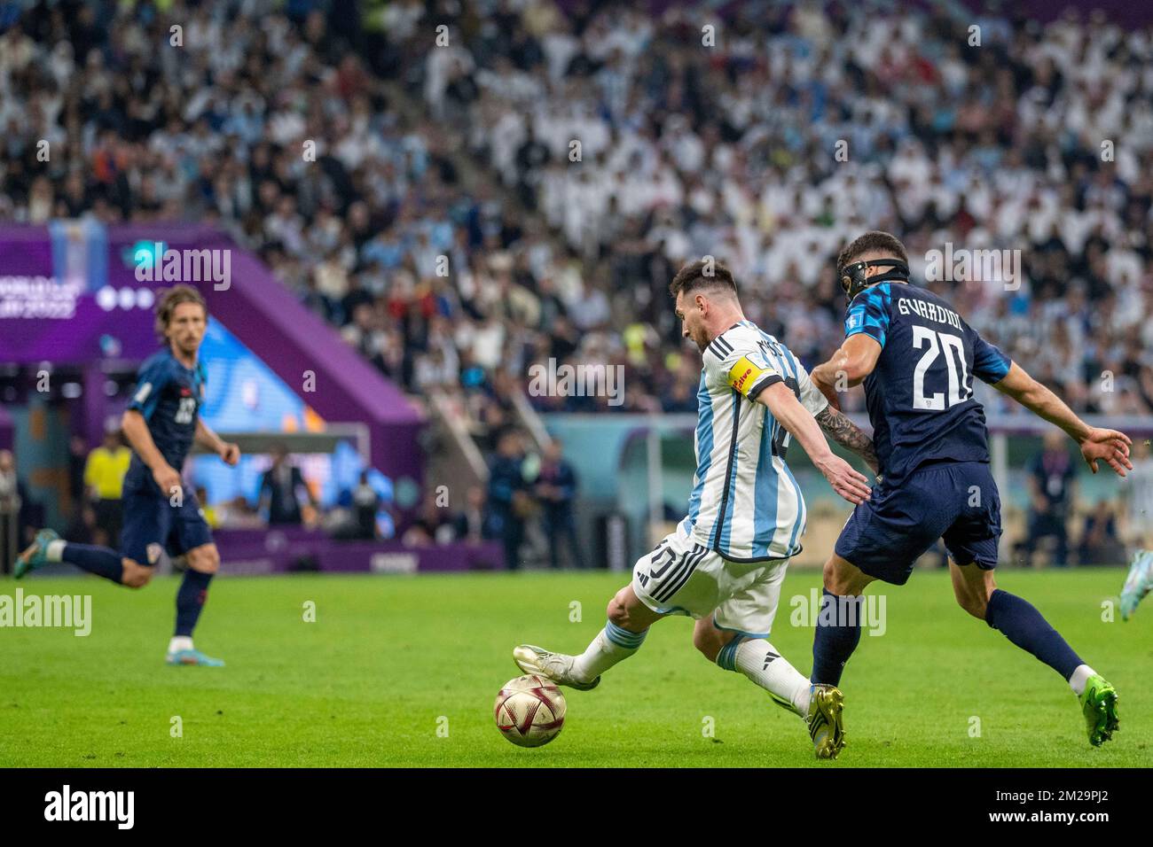 Lusail, Catar. 13th Dec, 2022. Lionel Messi of Argentina and Josko ...