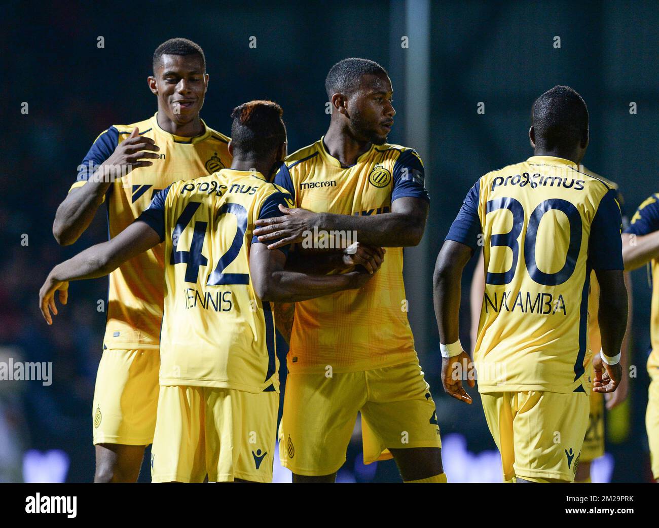 Club's Emmanuel Bonaventure Dennis (2L) celebrates with teammates after ...
