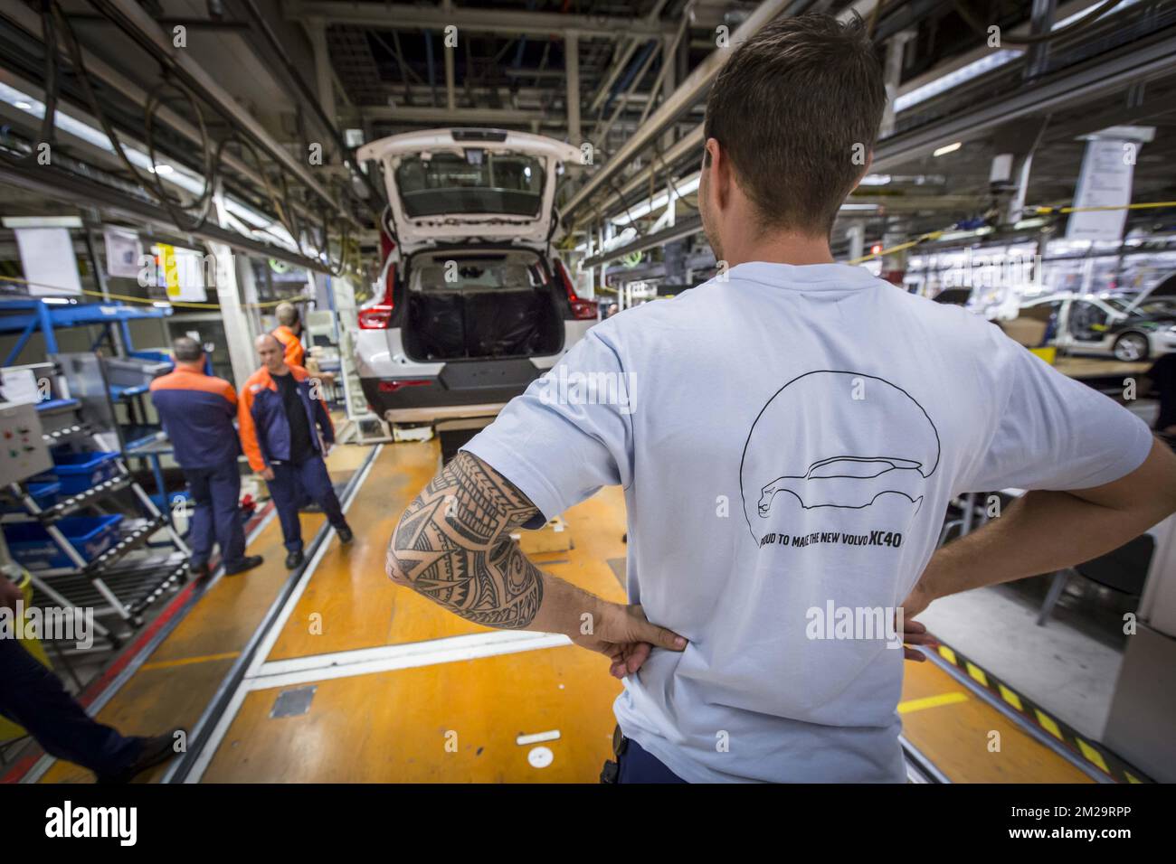 This handout picture, distributed by Volvo workers in action producing ...