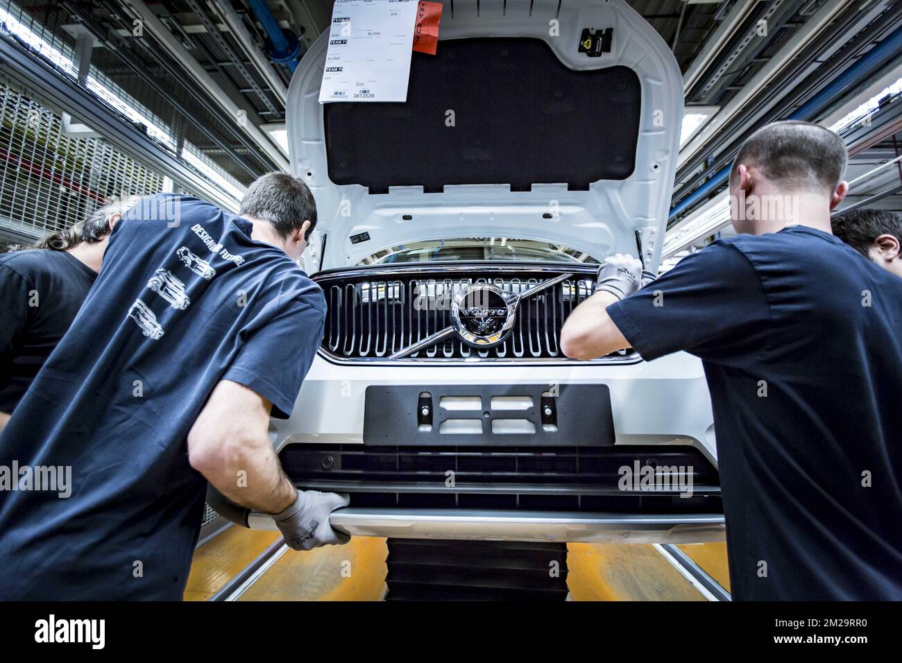 This handout picture, distributed by Volvo workers in action producing ...
