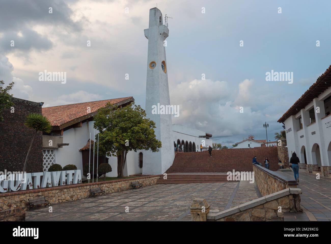 GUATAVITA, COLOMBIA - Guatavita main square scene with clock tower town ...
