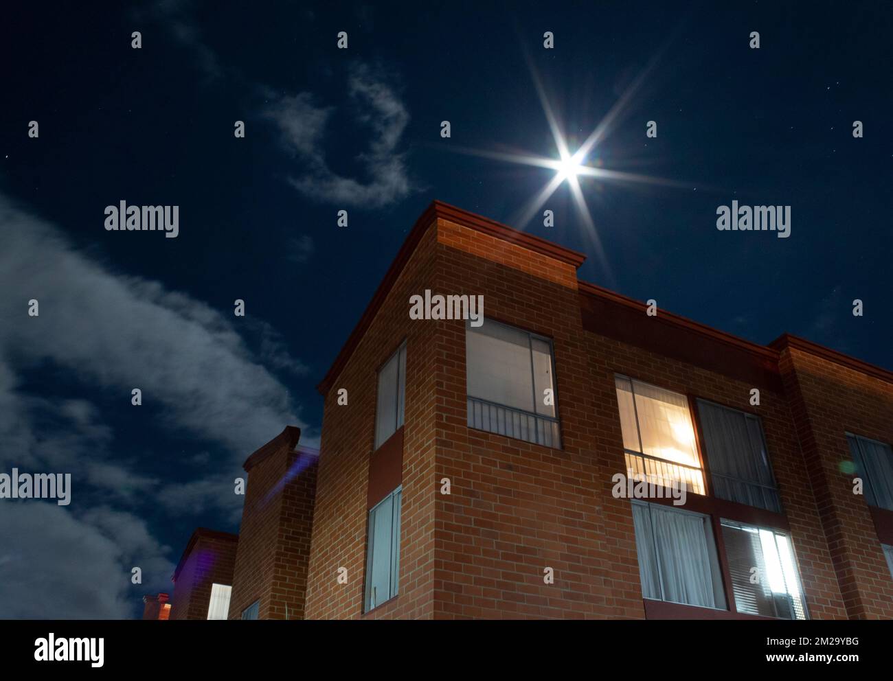 Beautiful night scene of brick houses residential unint with cloudy and ...