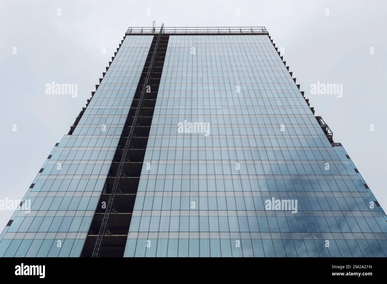 BOGOTA, COLOMBIA - Low Angle view of a Blue window modern skyscraper ...