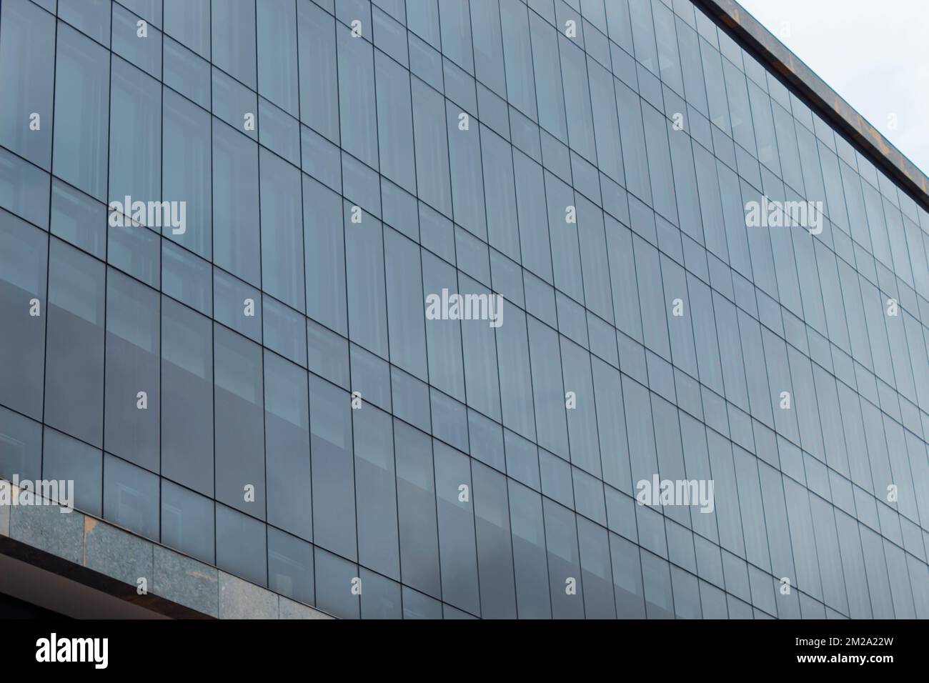 Blue modern windows building patter reflecting sky Stock Photo - Alamy