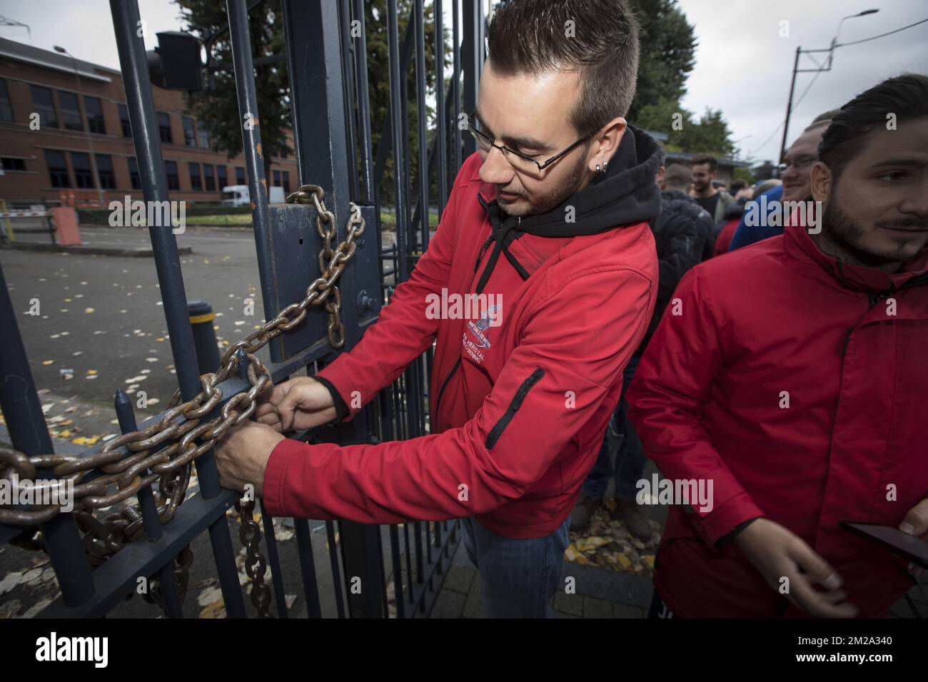 illustration picture shows a man who locks the doors during a strike by ...