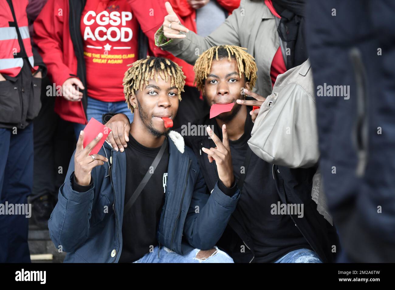 People pictured with red card during a picket line during a general ...