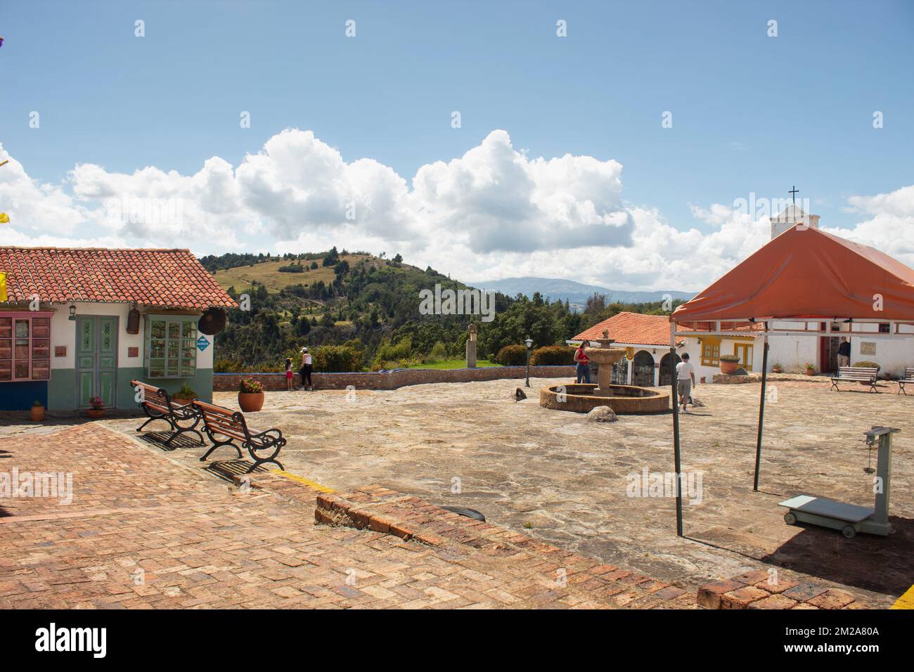 Recreation of an antique colombian boyaca town square with stone font ...