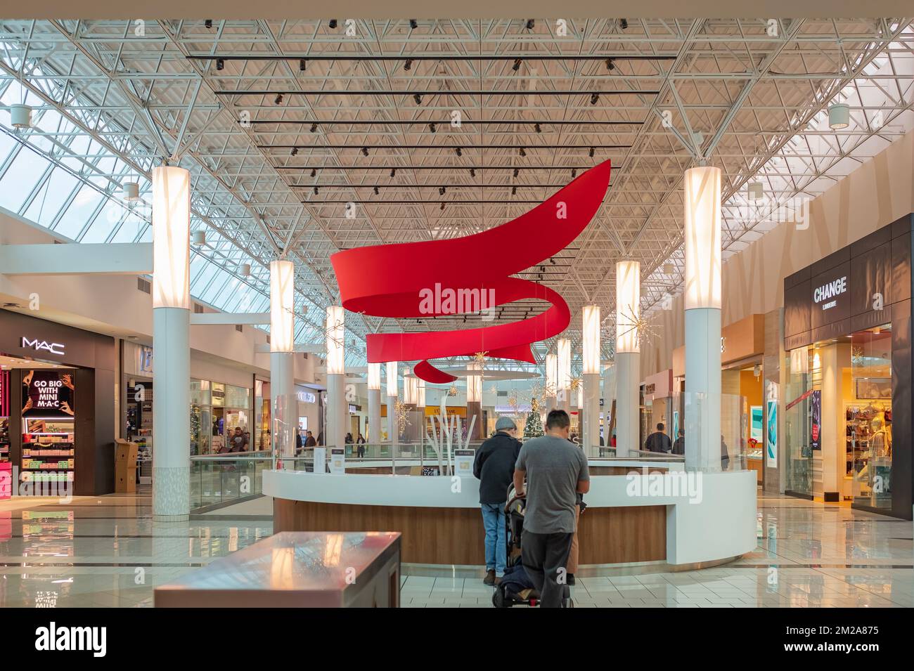 Interior in a modern shopping center. sale, consumerism and people ...