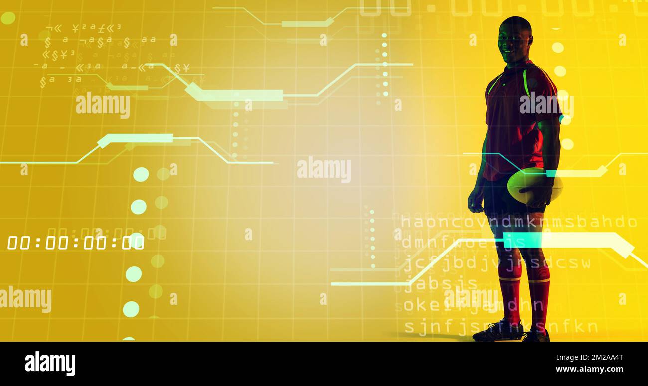 African american rugby player holding ball by computer language and ...