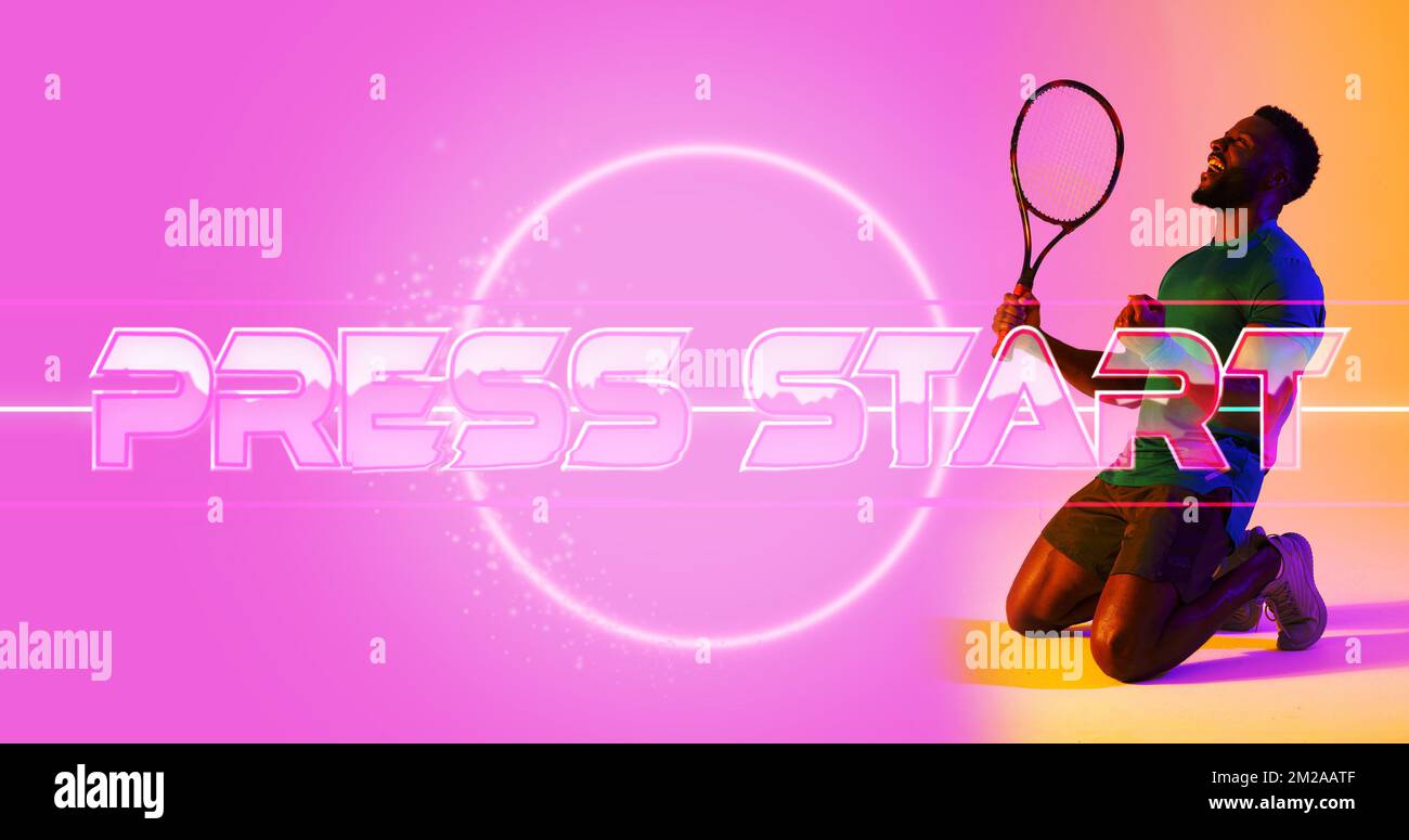 African american male tennis player with racket kneeling by press start ...