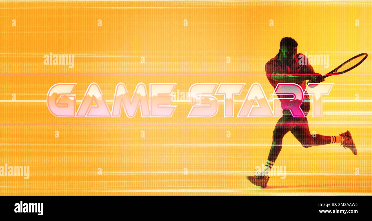 African american male player playing tennis with racket by game start ...