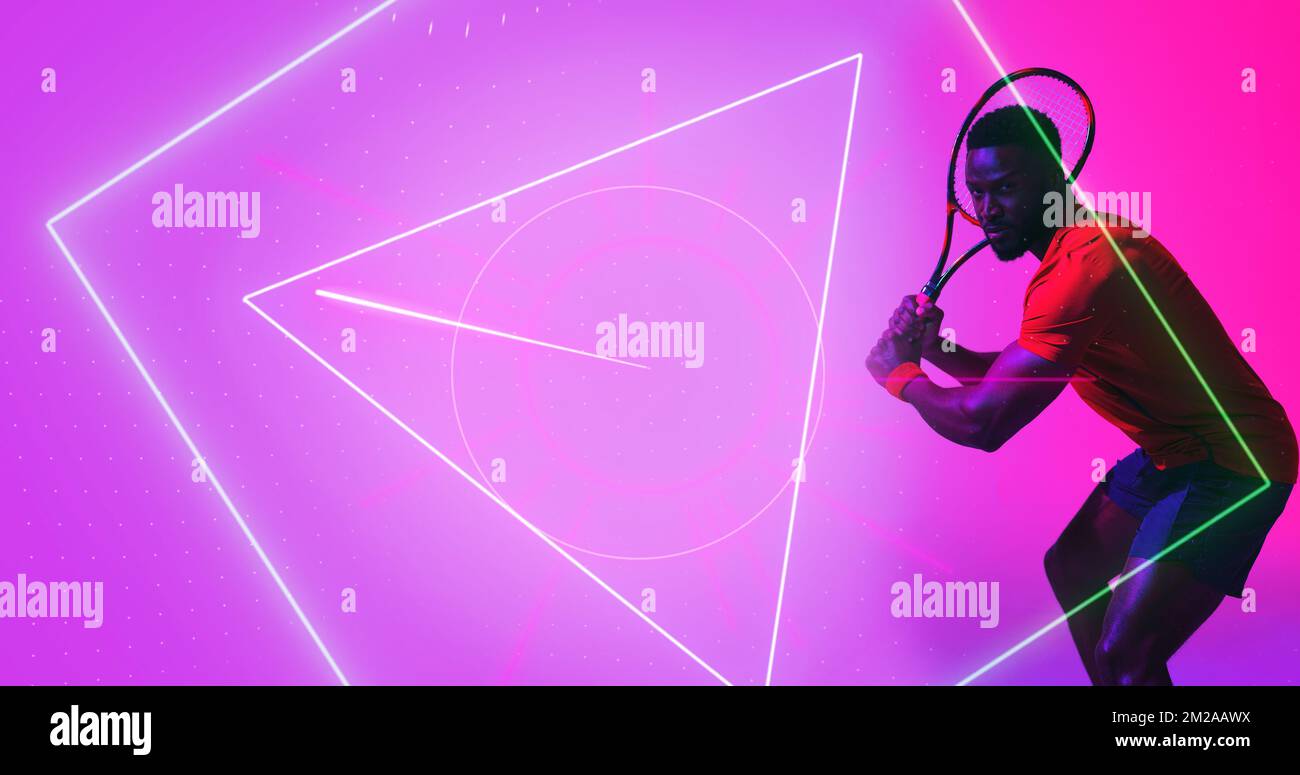 African american male tennis player holding racket by multiple ...