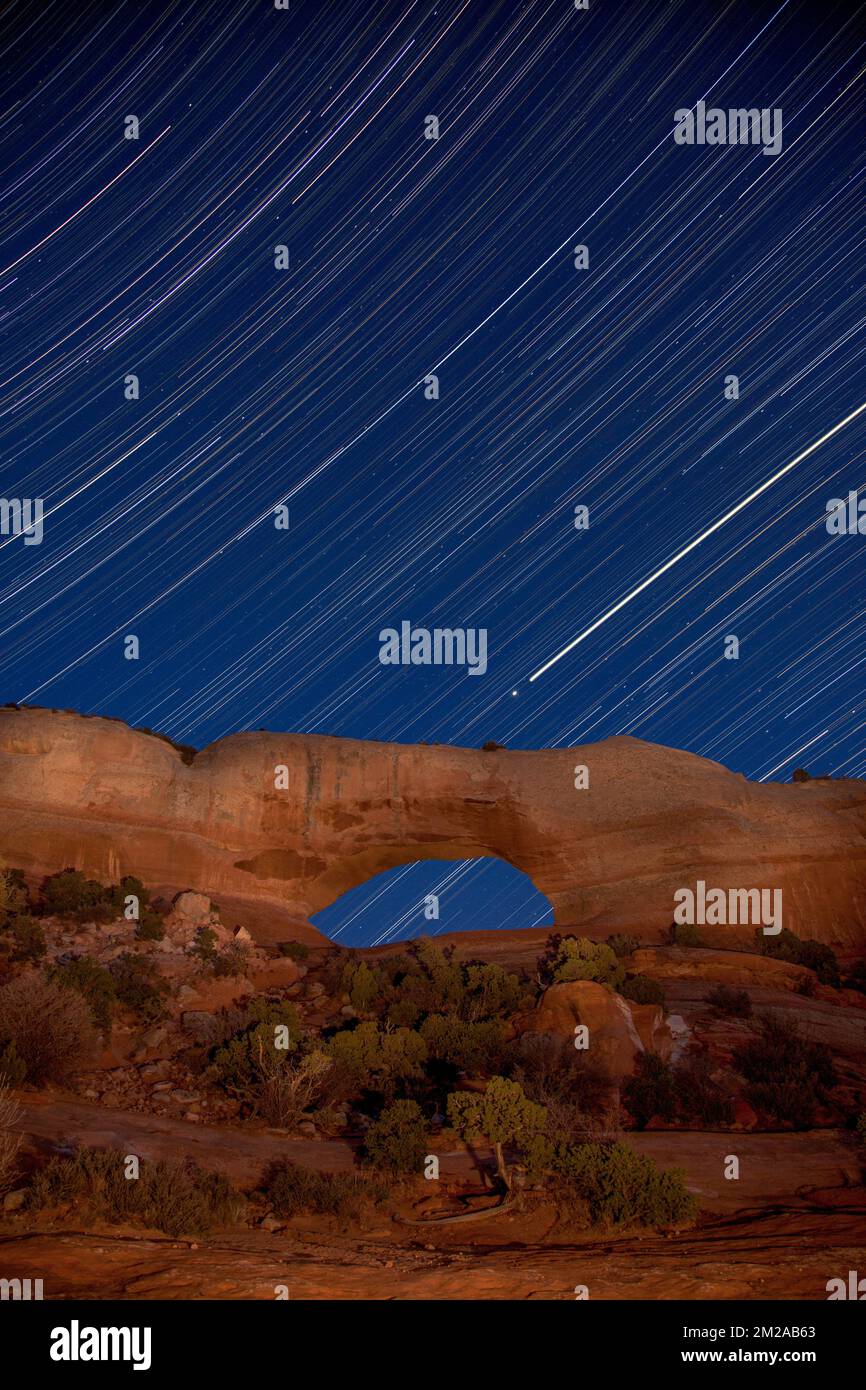 Star trails at night over Wilson Arch, Utah, USA Stock Photo - Alamy