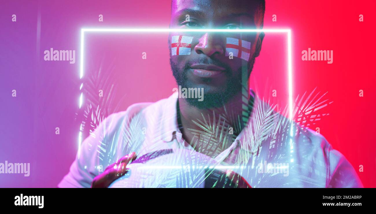 Illuminated rectangle and plant over african american male fan with ...