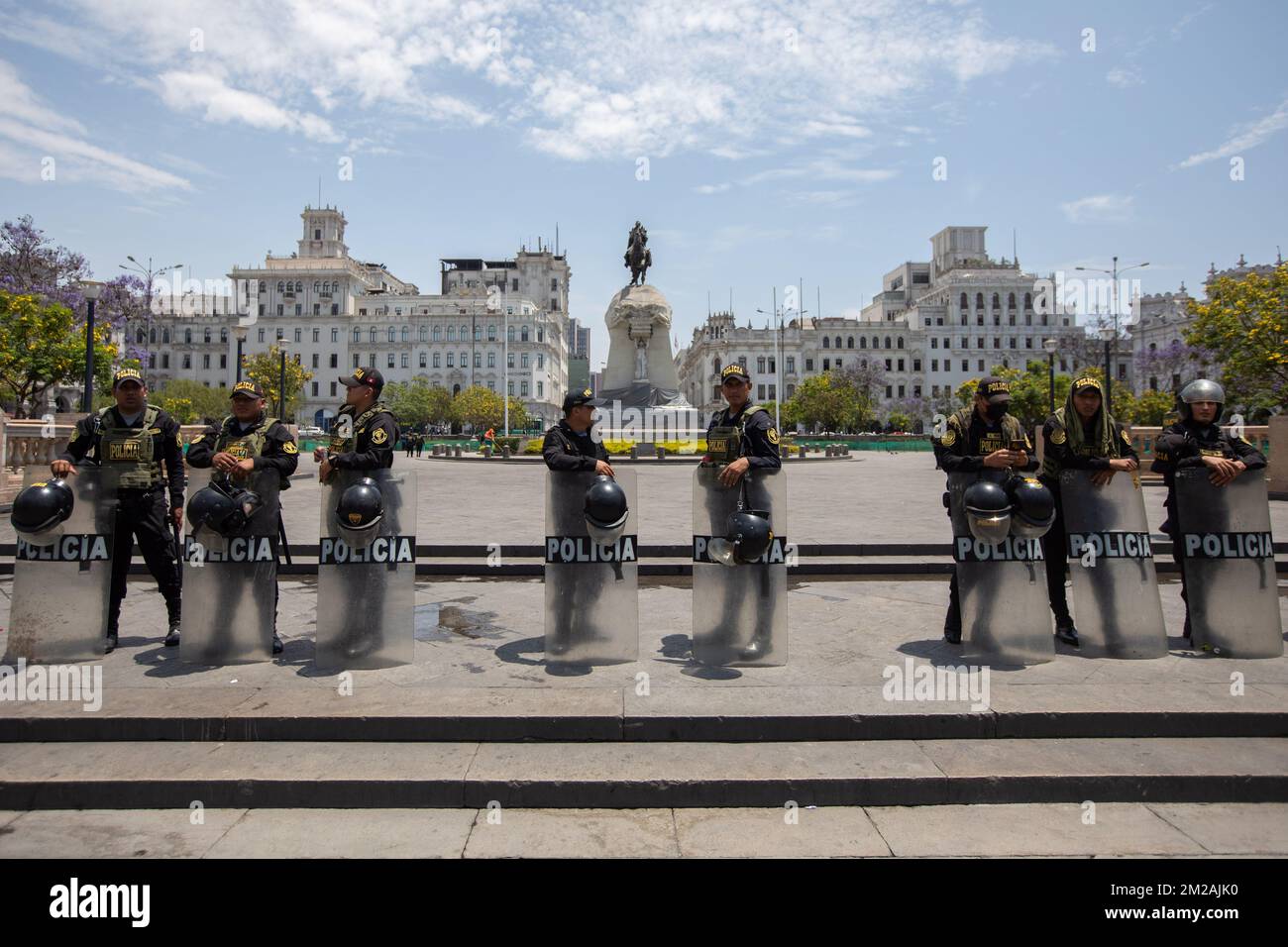 Lima, Peru. 13th Dec, 2022. Police officers stand guard in the historic ...