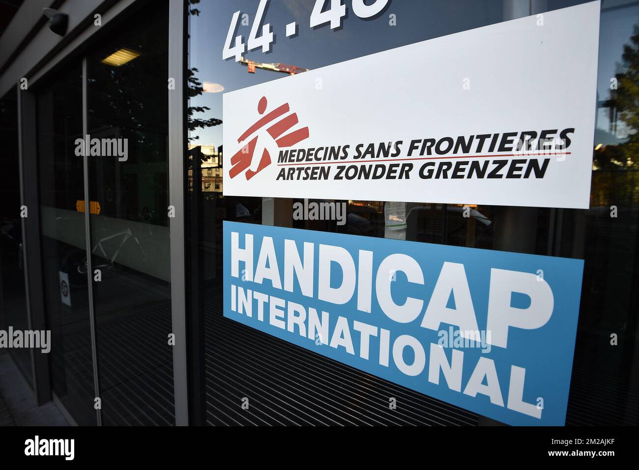 Illustration picture shows the logos of Handicap International and ...